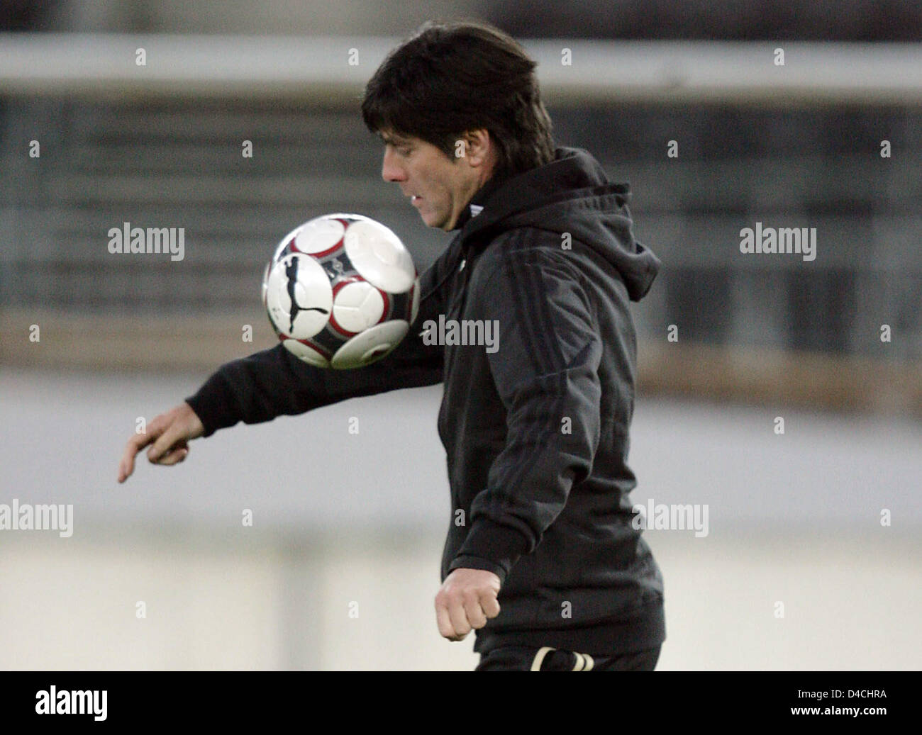 Germany's national head coach shown in action during his team's ...