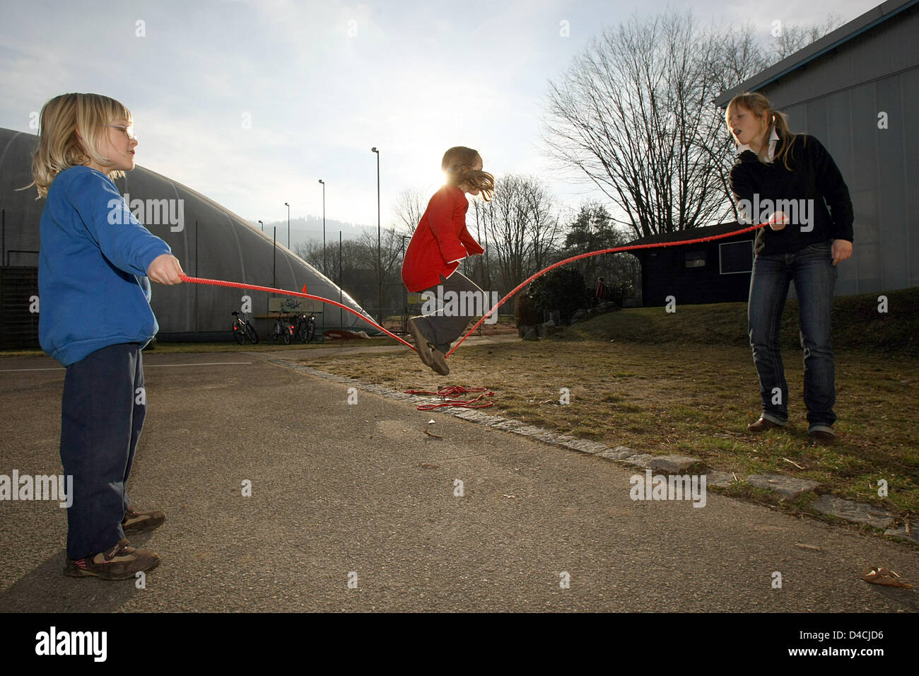 A teacher and her pupils do rope skipping in Germany's first sports ...