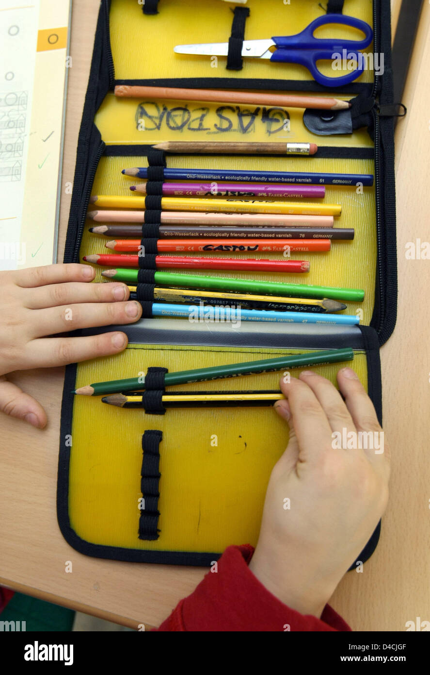 A pupil shows its pencil case in Germany's first sports primary school ...
