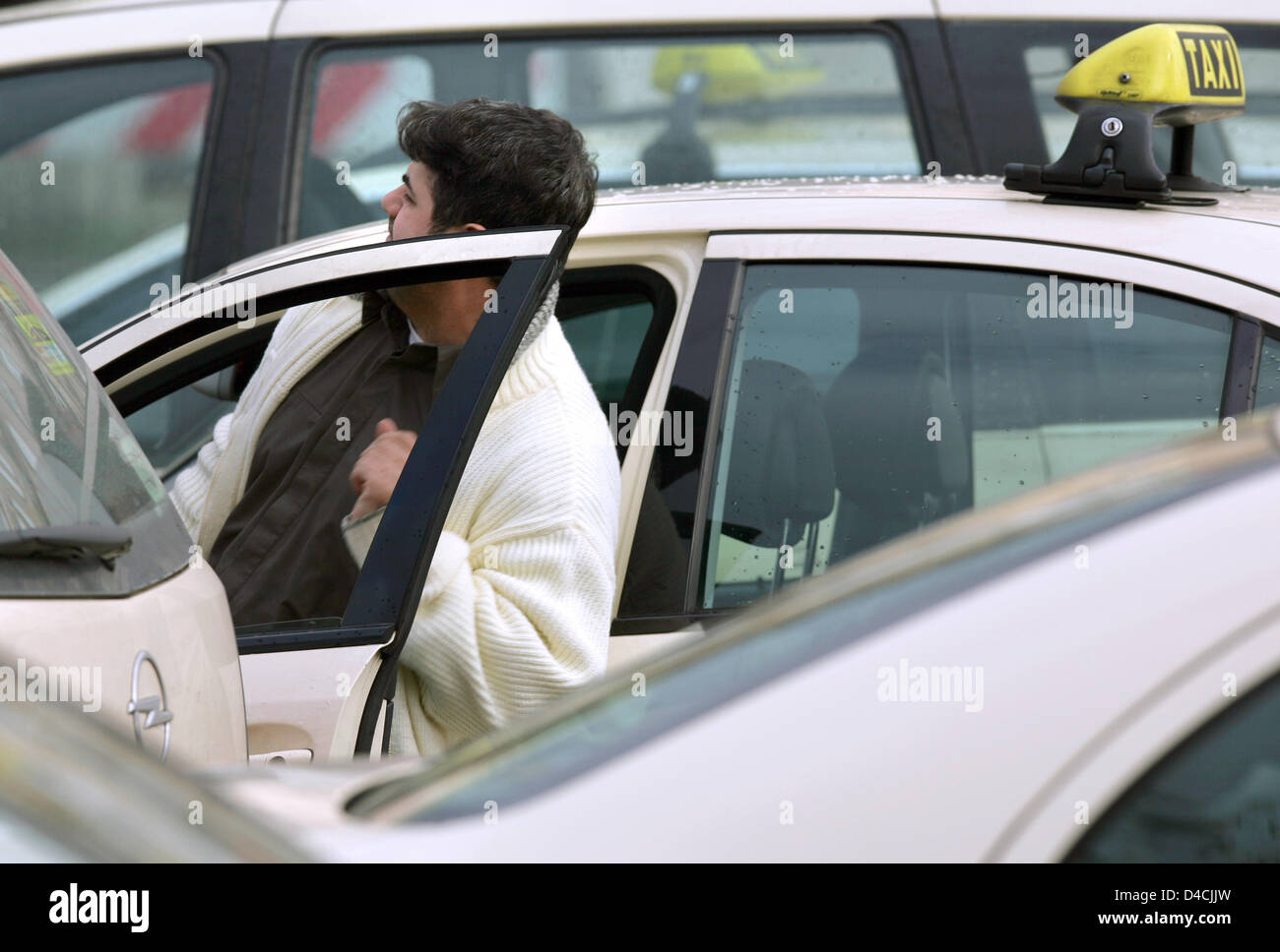 Driver entering hi-res stock photography and images - Alamy