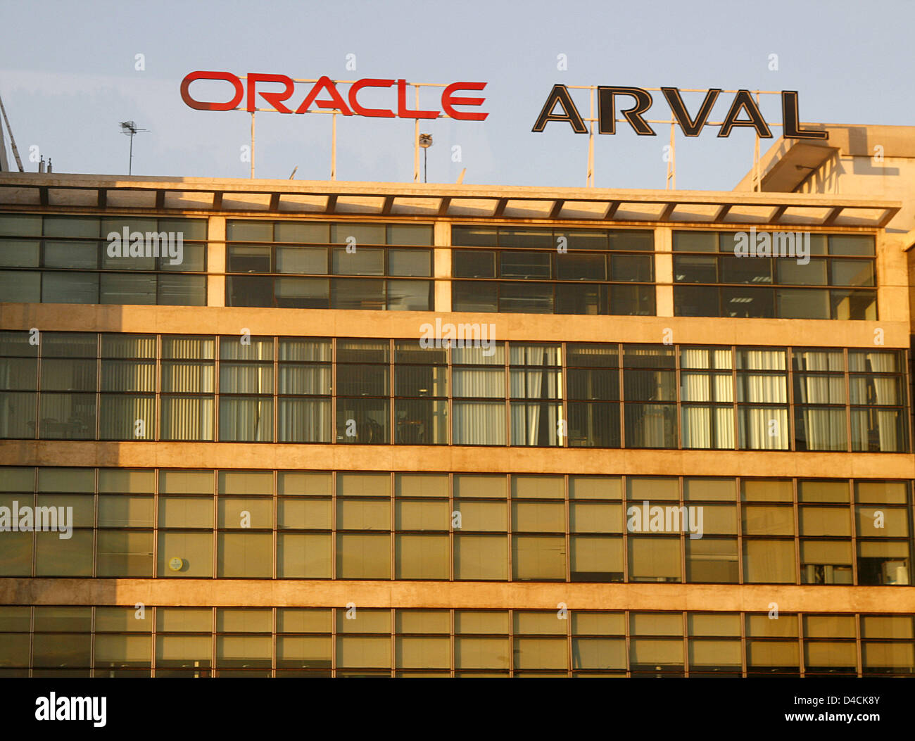 The picture shows a building with the logos of Oracle and Arval in ...