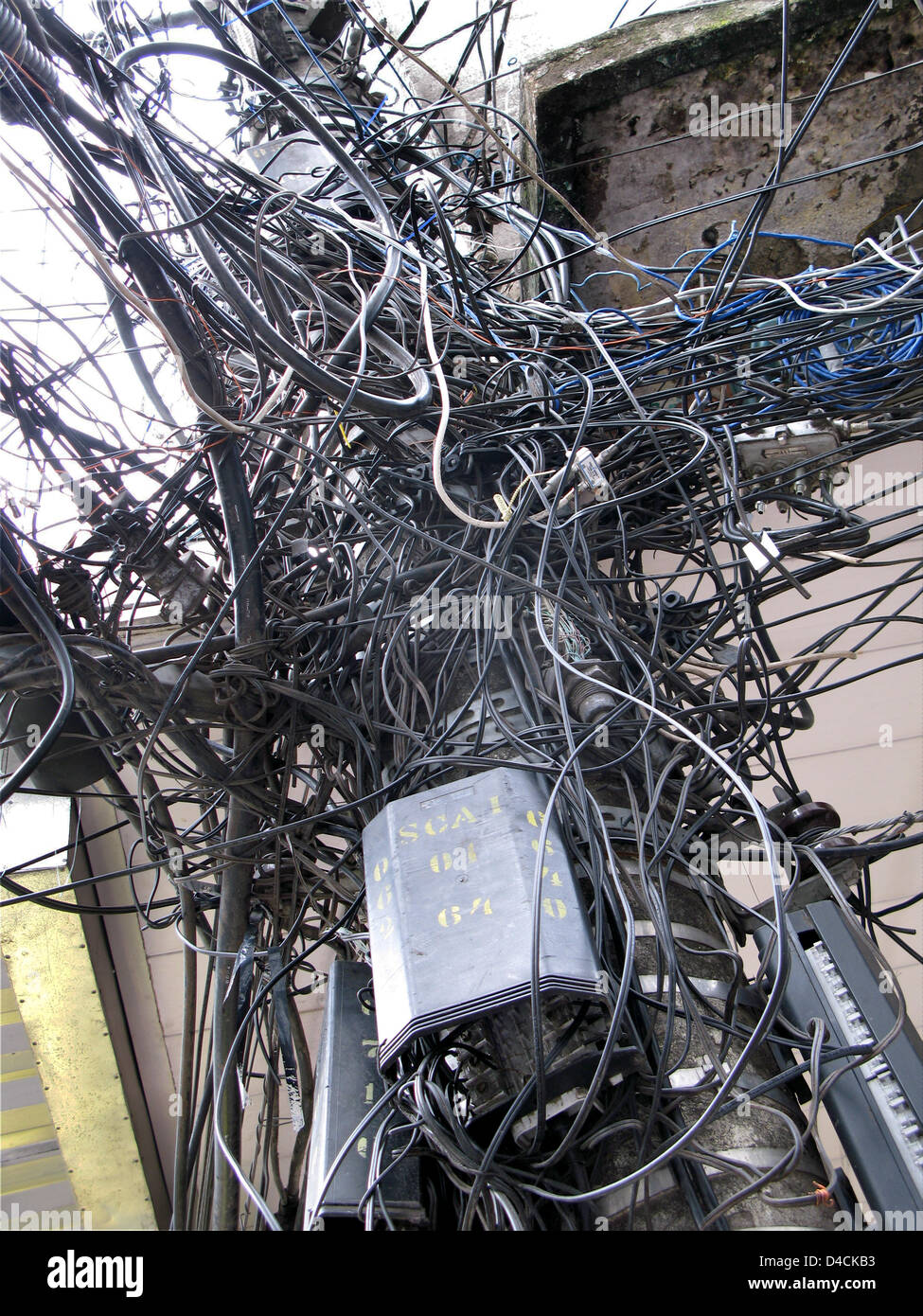 A utility pole with cables is pictured at favela Rocinha, Latin America ...
