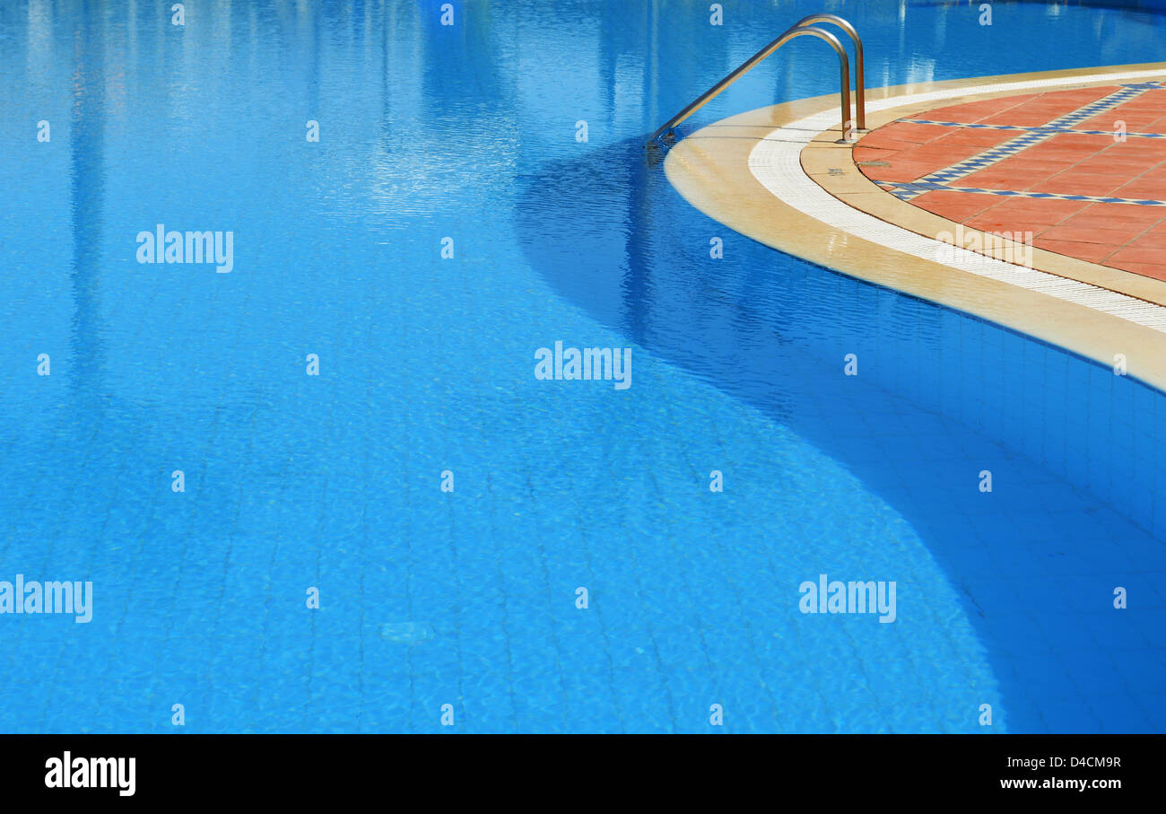 Swimming pool during summer time Stock Photo - Alamy