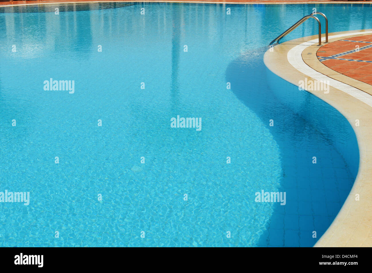 Swimming pool during summer time Stock Photo - Alamy