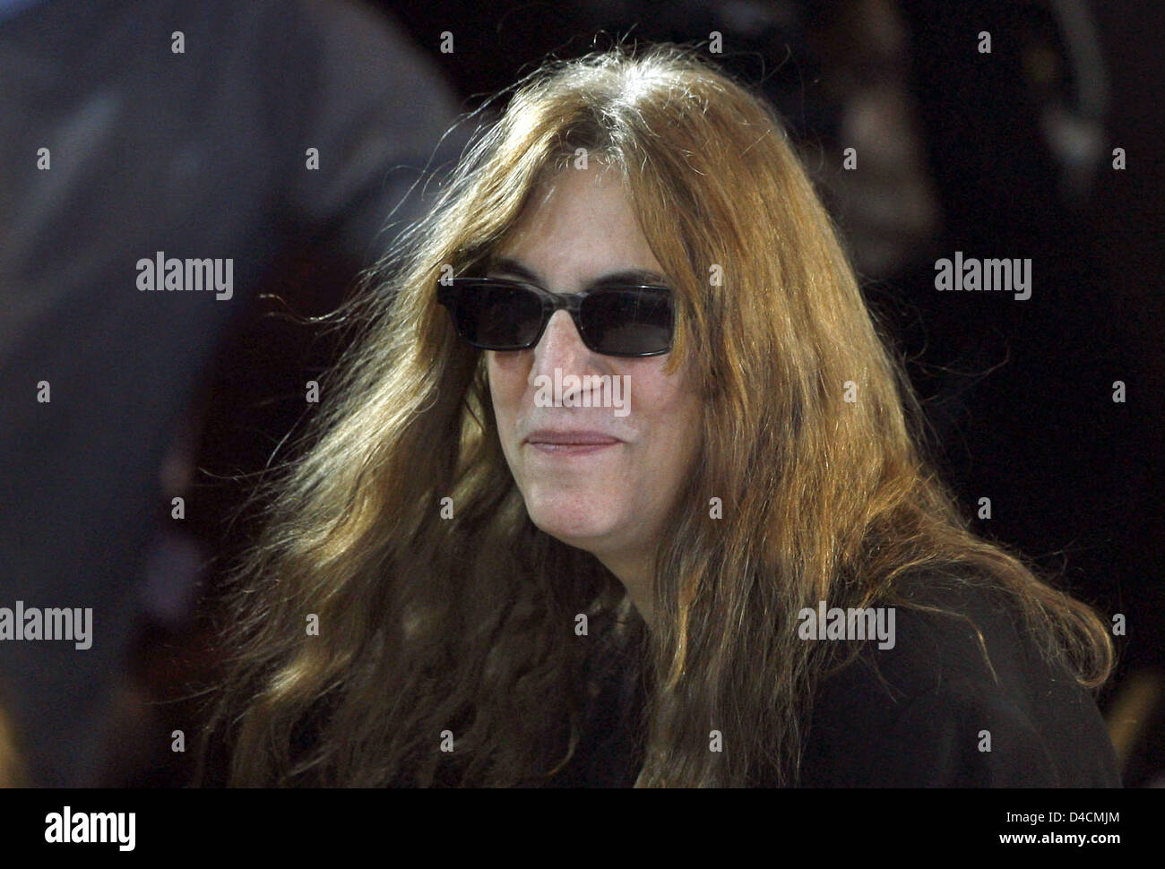 US singer Patty Smith poses for photos s she arrives for the screening ...