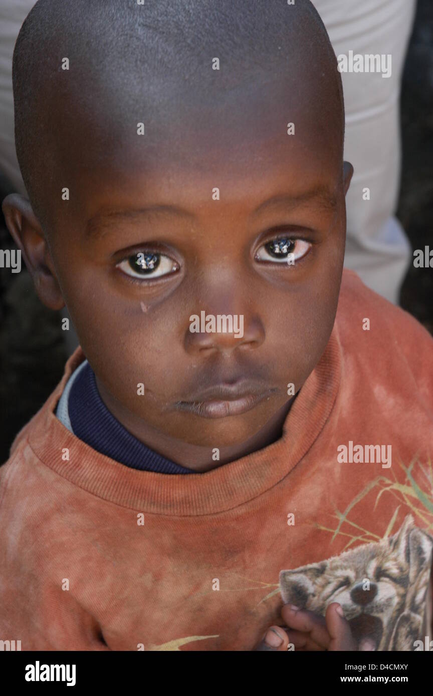 The picture shows a small child living in the Huruma slum in Nairobi ...