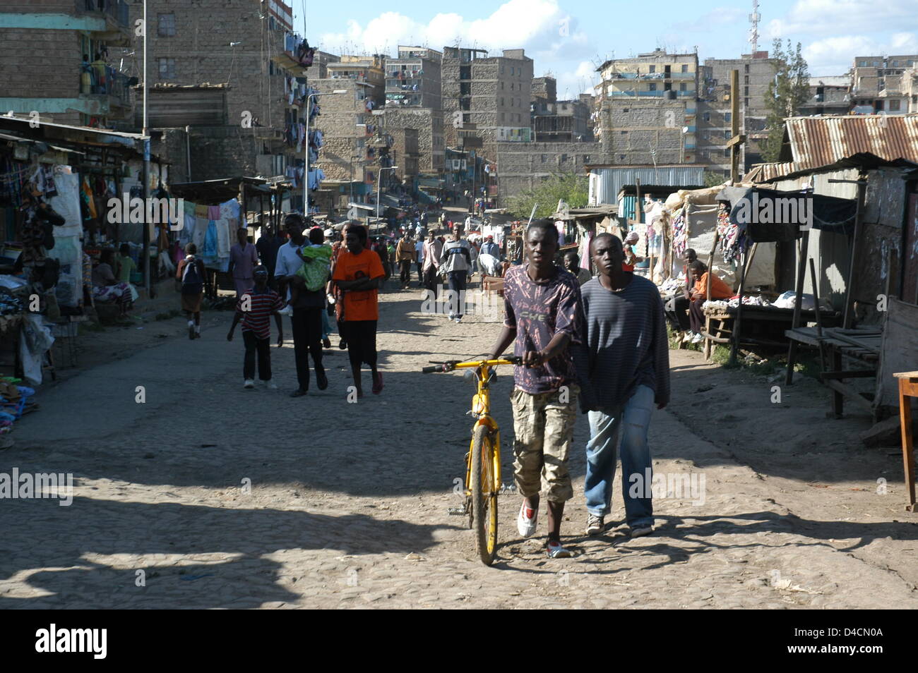 The picture shows a street scene in the Huruma slum in Nairobi, Kenya ...