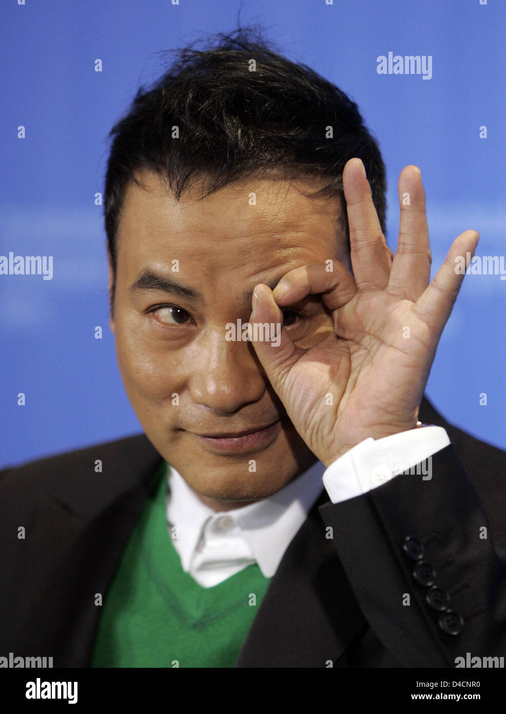 Actor Simon Yam poses during a photo call for his film 'Sparrow' at the ...