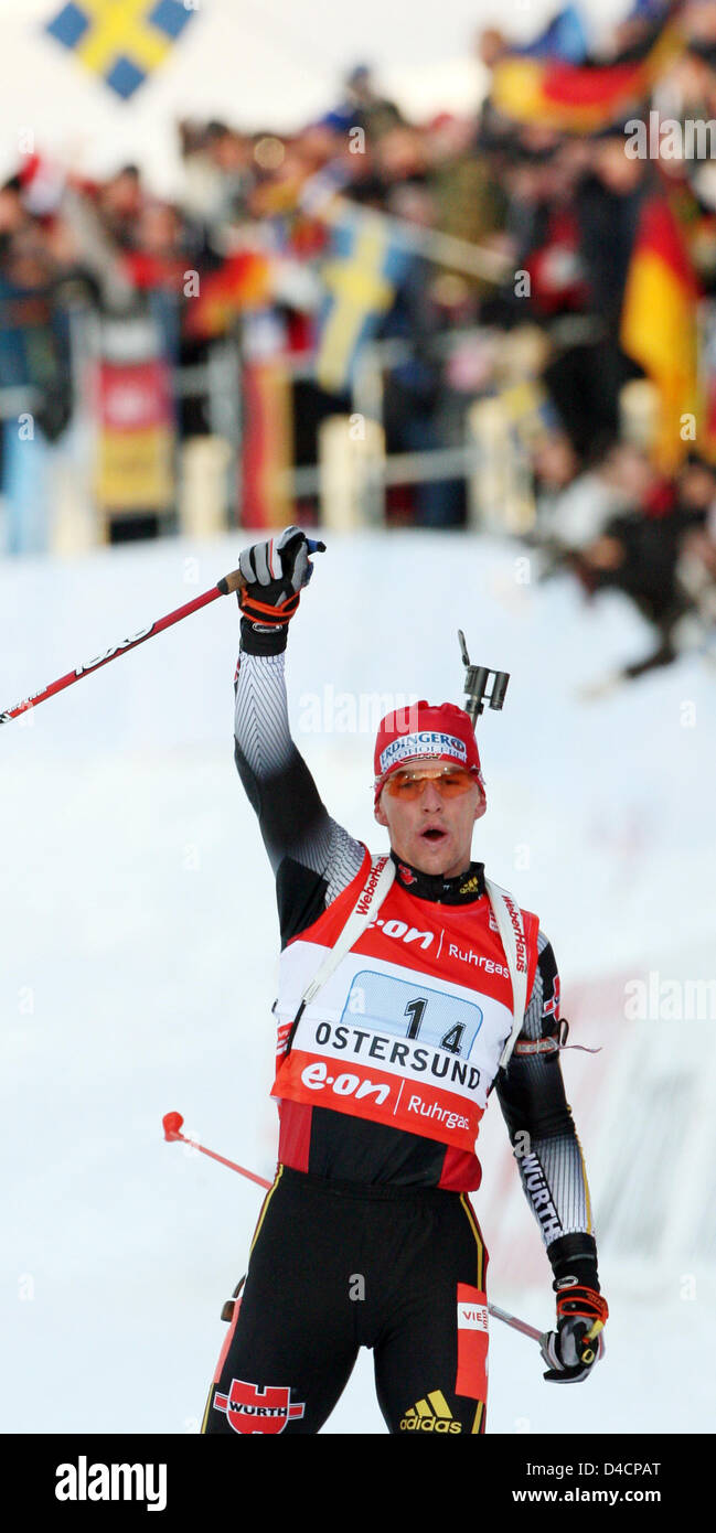 German biathlete Michael Greis celebrates at the end of the mixed relay ...
