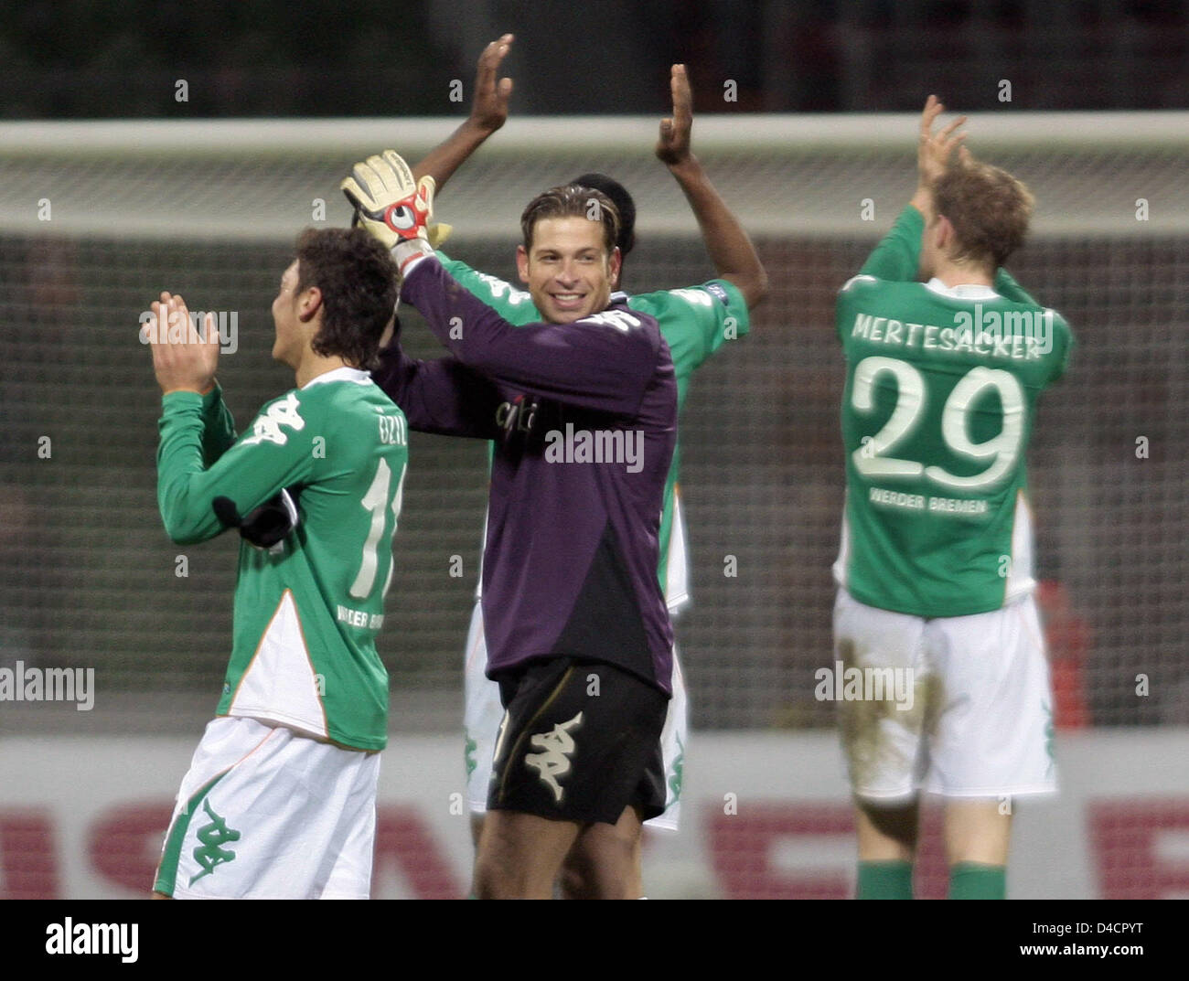 Bremen's goalkeeper Tim Wiese (front) and teammates wave at the fans ...