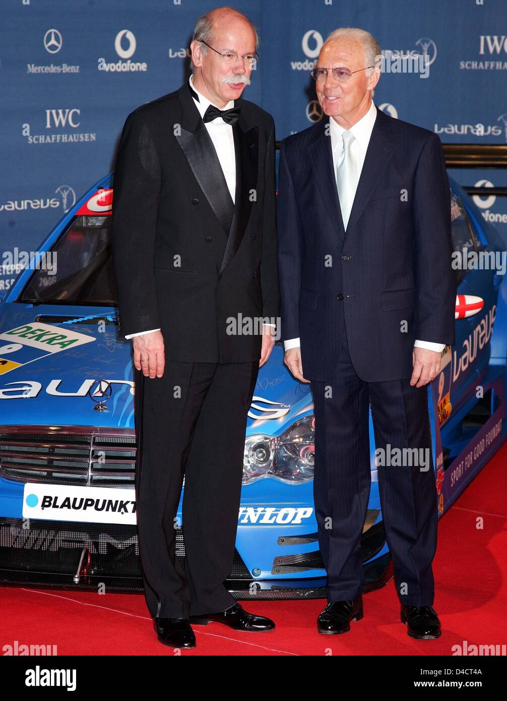 Dieter Zetsche, CEO of Daimler AG, and Franz Beckenbauer (R) arrive at ...