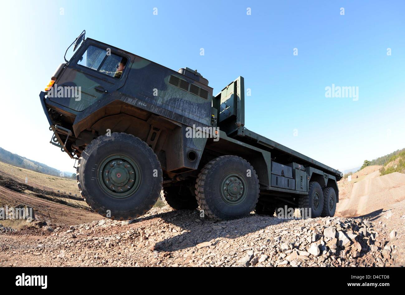 A 10 ton multi-purpose lorry type 'Multi' crosses obstacles at the ...