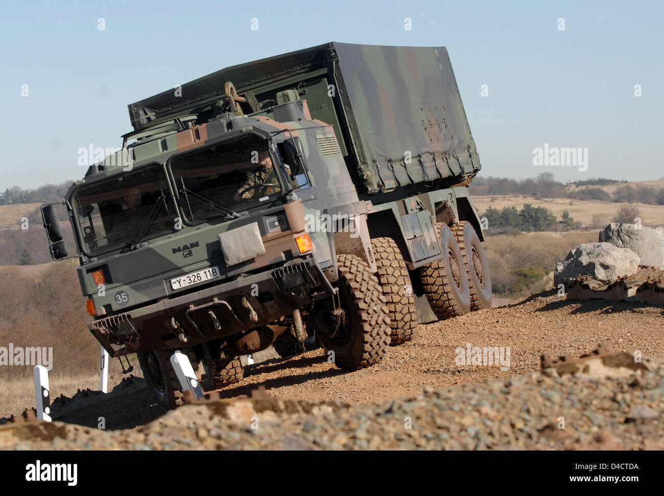 A 10 ton 'Multi'-type lorry drives on a sloping track at the Bundeswehr ...