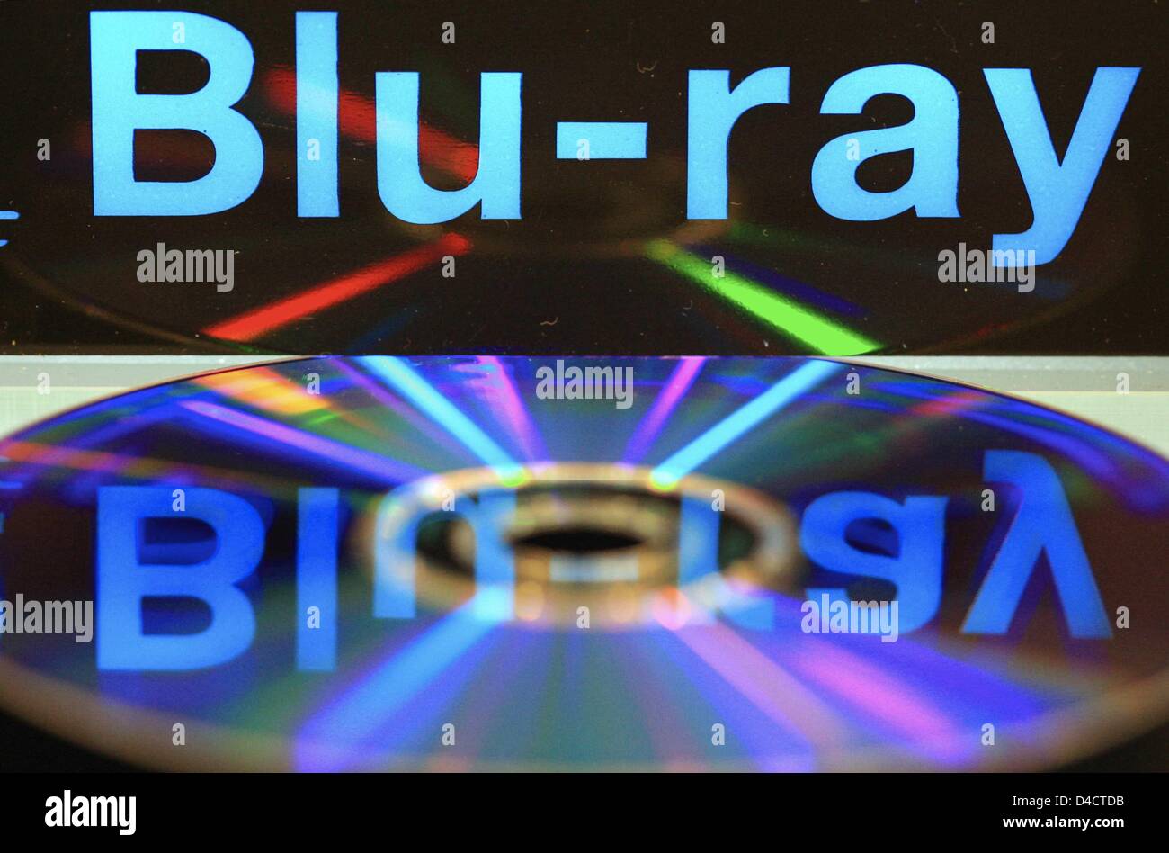 The Blu-ray Disc logo reflects on a DVD in Burgkunstadt, Germany, 19 ...