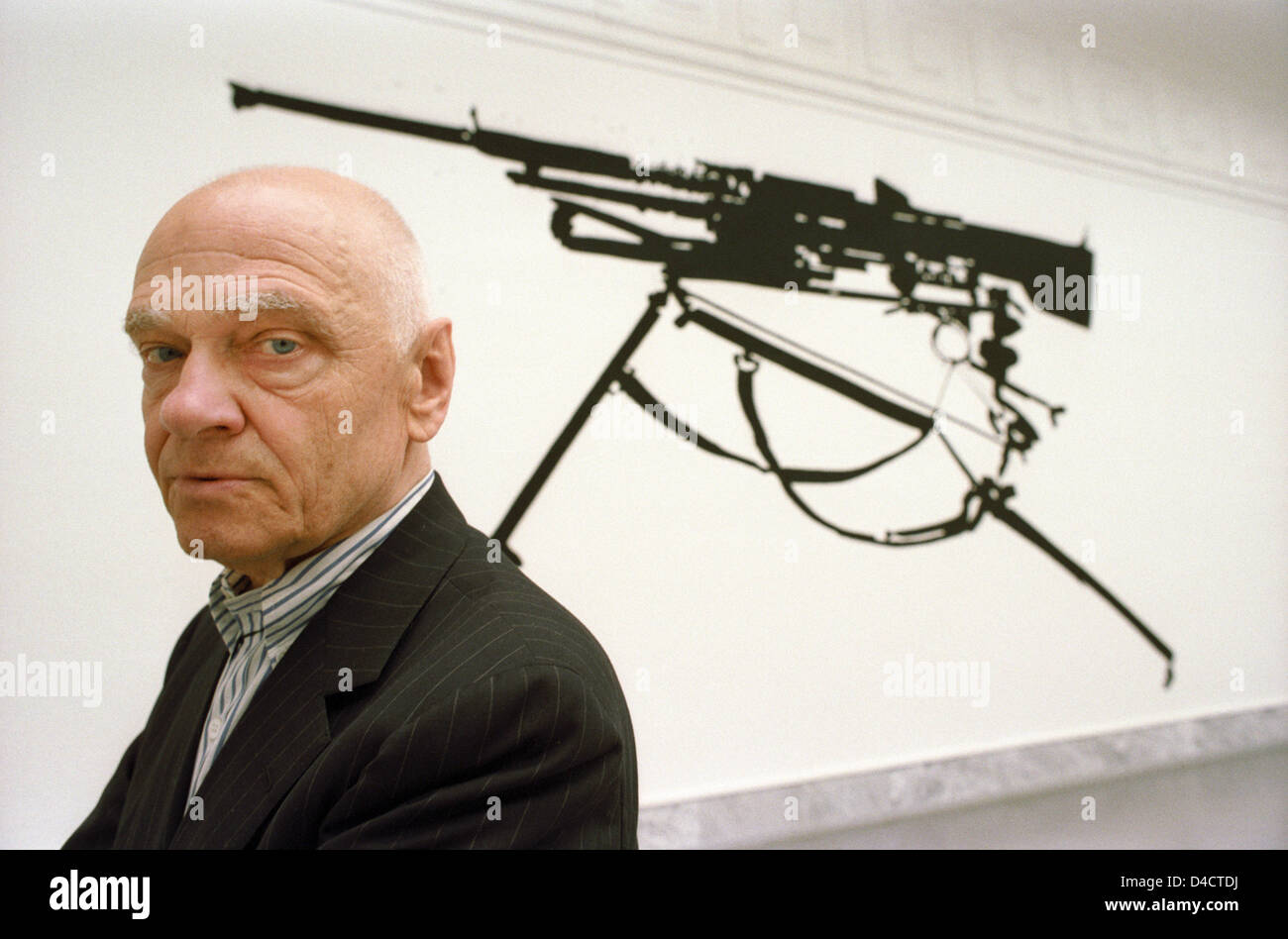 (dpa file) - Painter K.R.H. Sonderborg portrayed in front of one of his ...