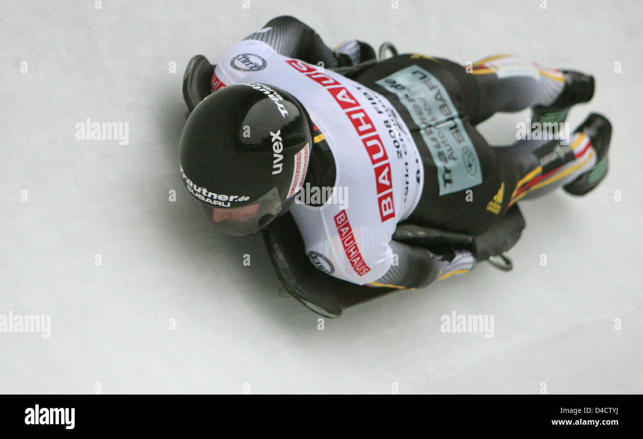 German skeleton athlete Anja Huber shown in action during her first of ...