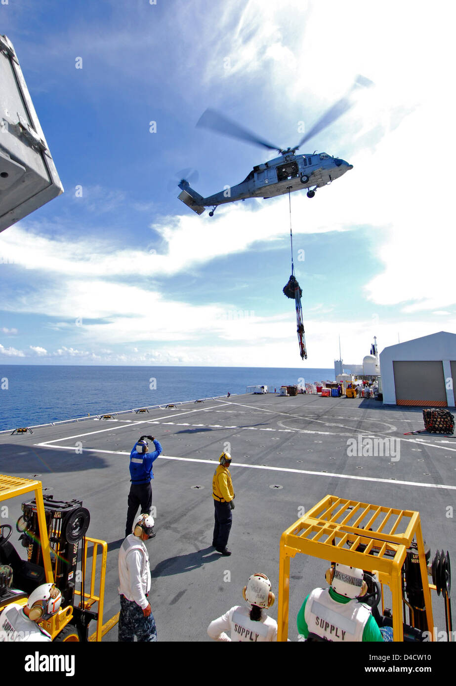 An MH-60S Knighthawk Helicopter Conducts a Vertical Replenishment ...