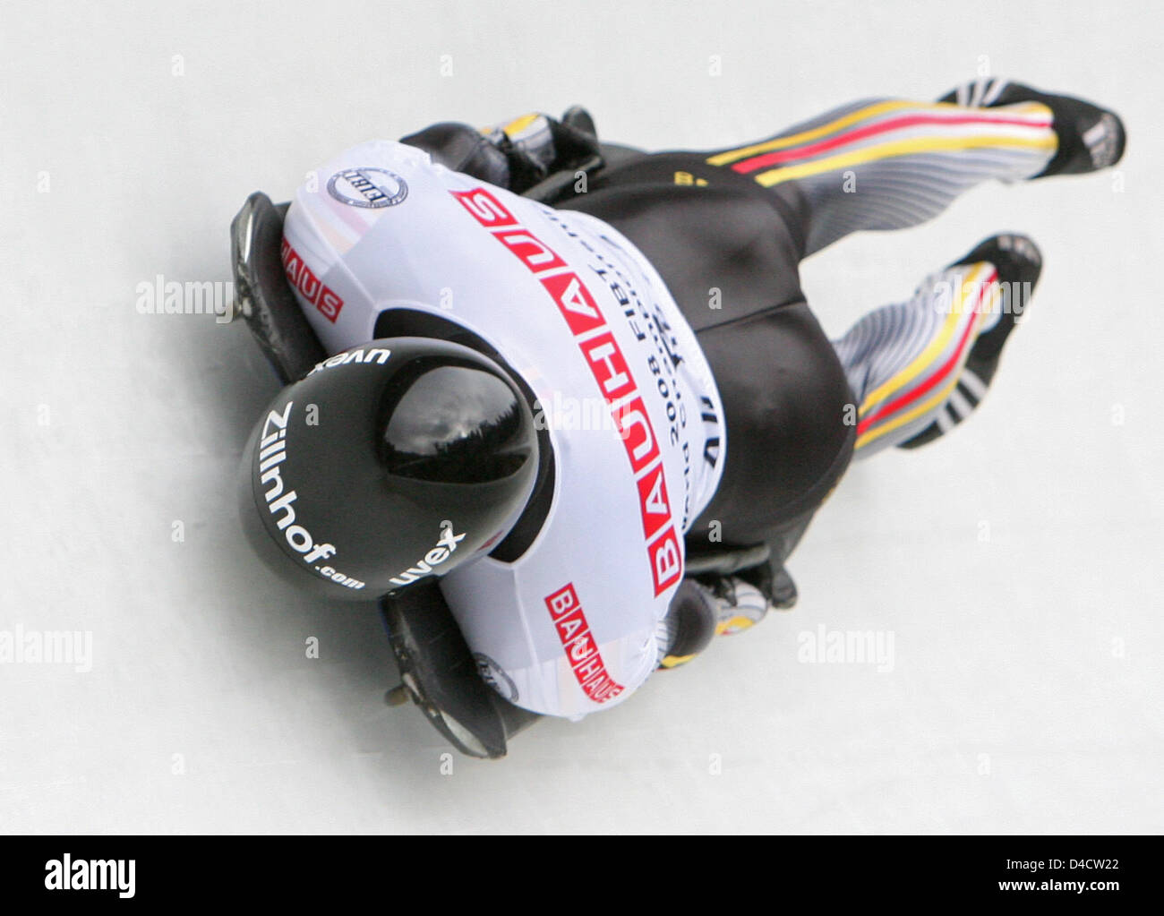 German skeleton athlete Florian Grassl shown in action at the third of ...