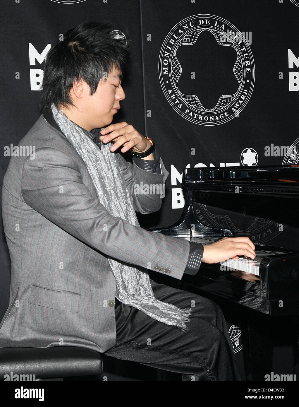 Chinese pianist Lang Lang plays piano after being appointed president ...