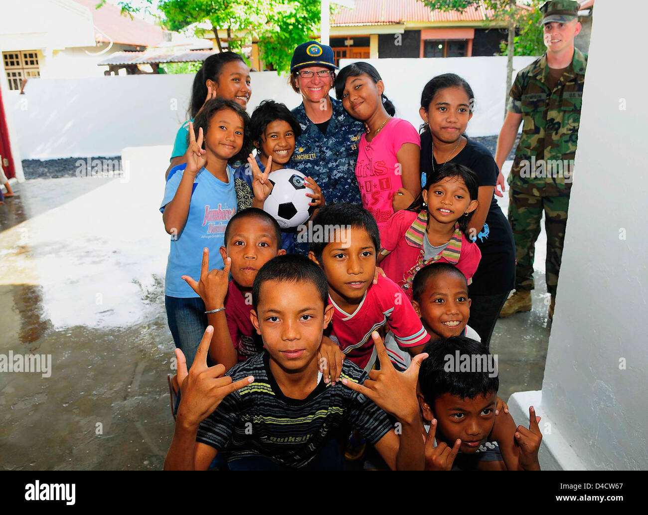 PP 2010 Commander Capt. Franchetti Poses for a Photo With Indonesian ...