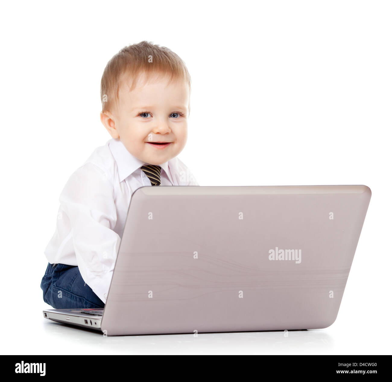Child using a laptop Stock Photo - Alamy