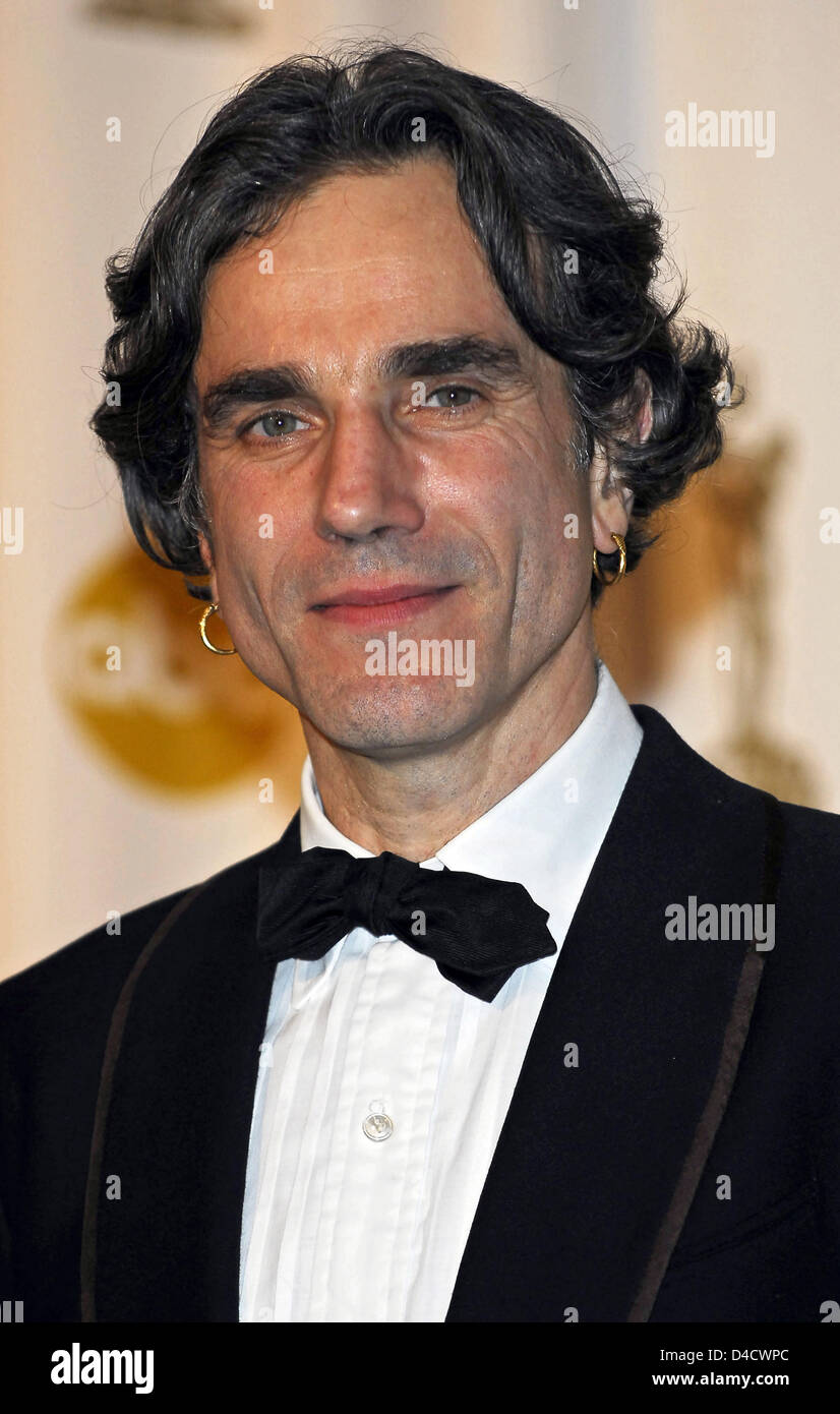 Winner for Best Actor, Daniel Day Lewis, poses in the photo press room ...