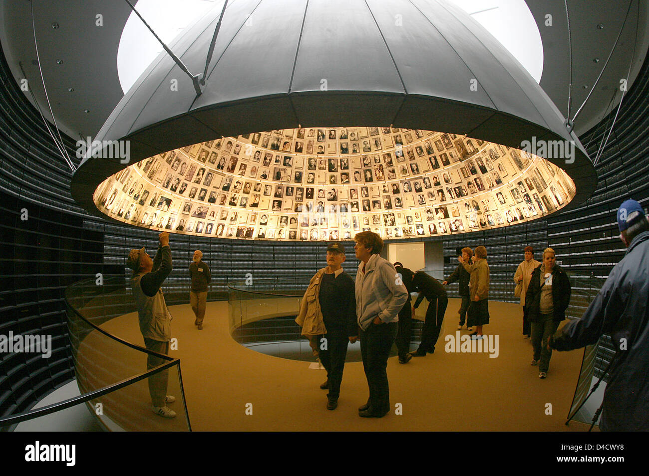 Visitors to Yad Vashem pictured in the Hall of Names in Jerusalem ...