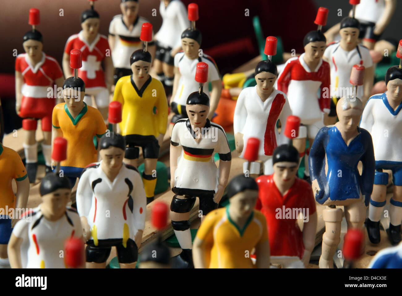 Painted figures for popular table football game 'Tipp-Kick' pictured at ...
