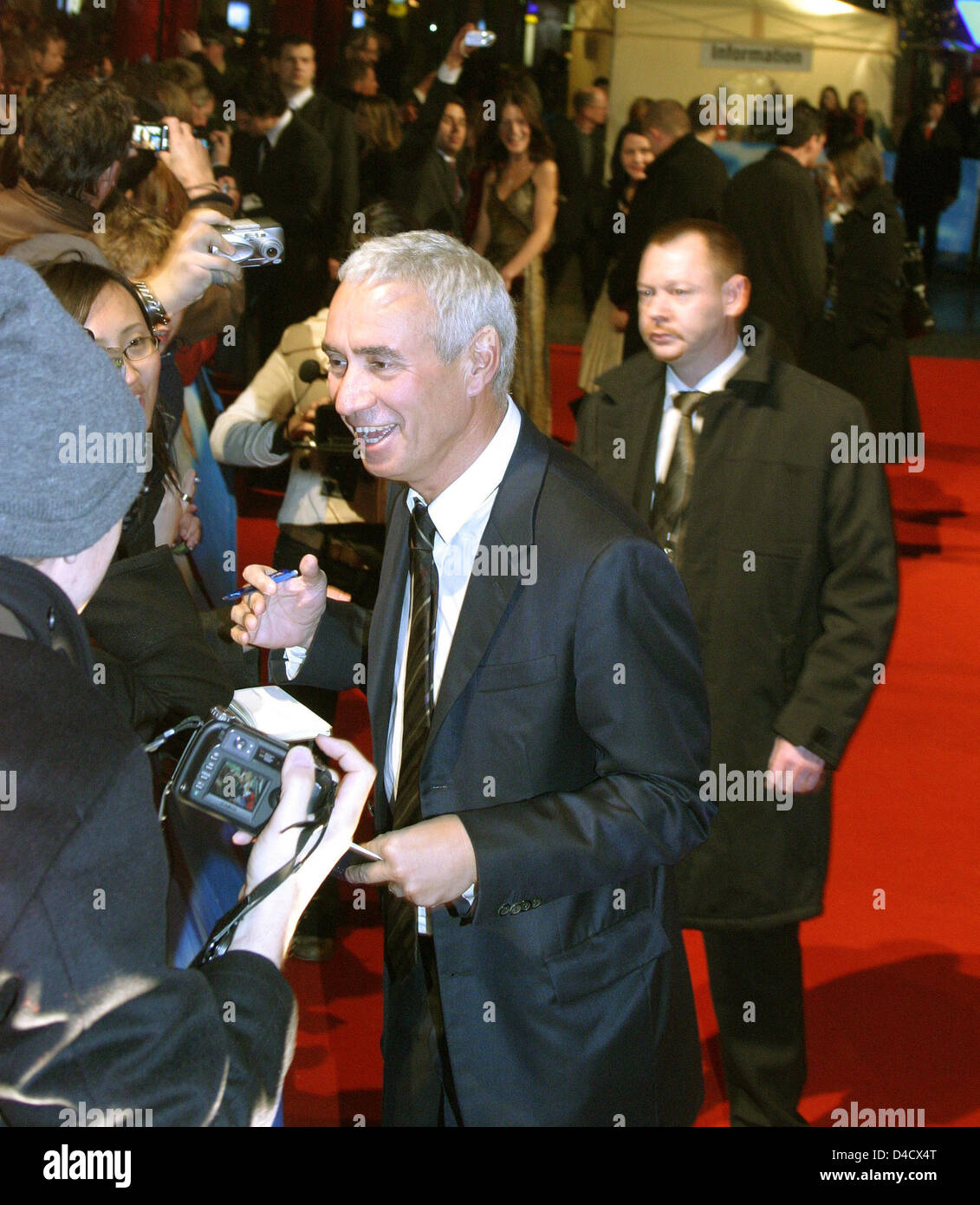Director Roland Emmerich signs autographs ahead of the World Premiere ...