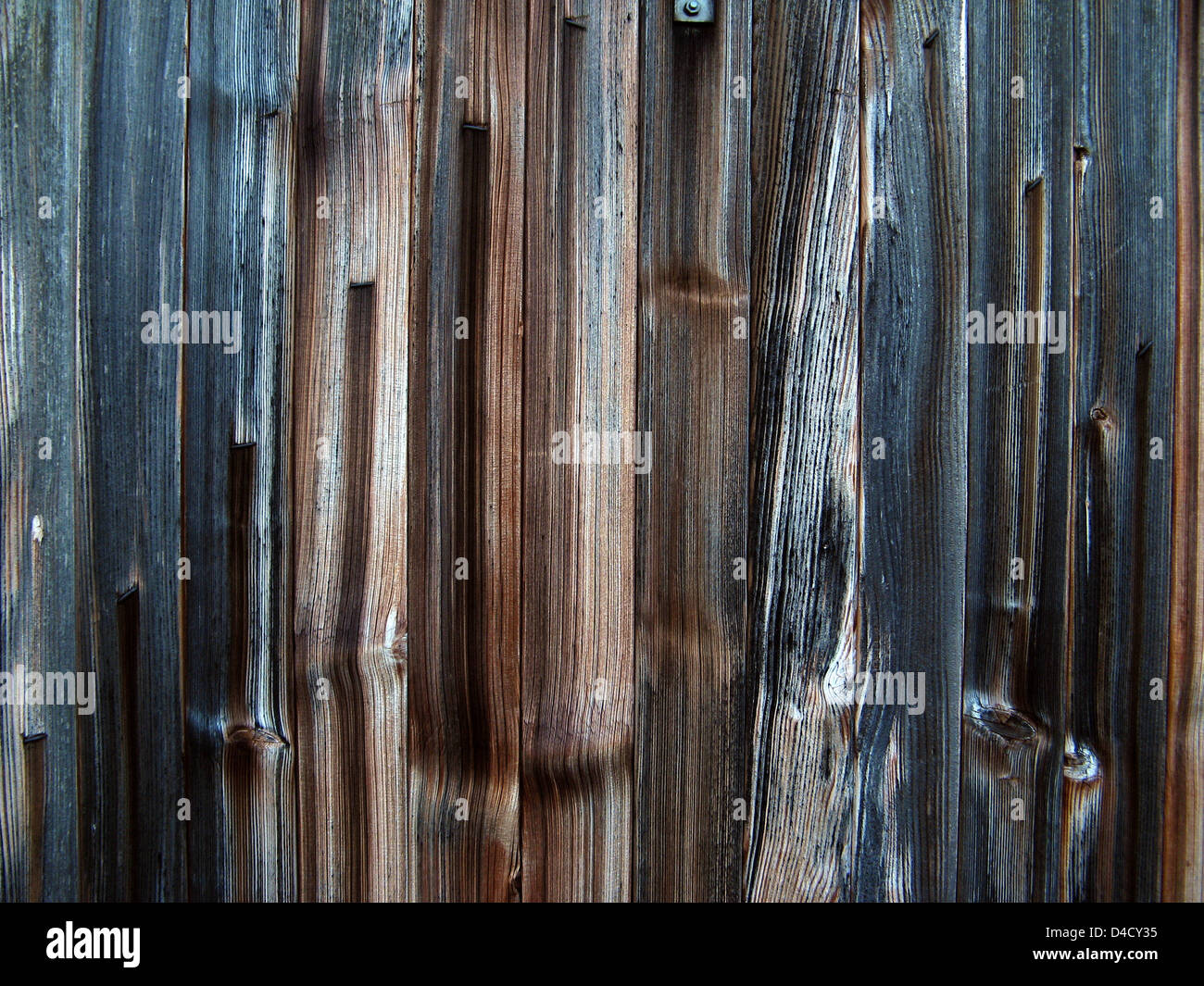 The pictures shows the weathered wood of a barn wall in Schiltach in ...