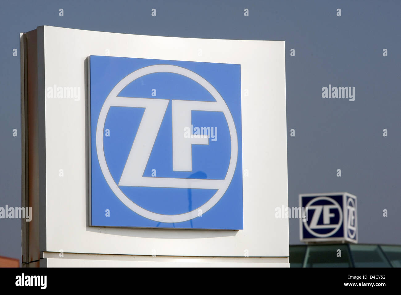 The photo depicts the company logo at the ZF headquarters in ...