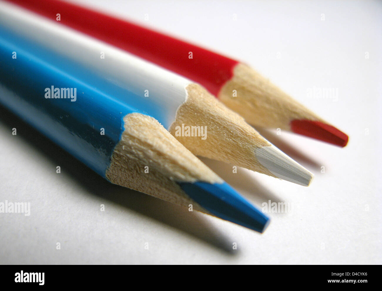 The picture shows red red, white and blue pencils the french natioonal ...