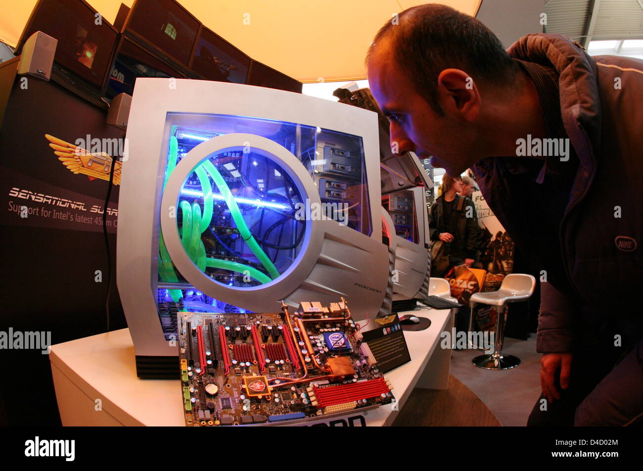 A visitor to the IT trade fair CeBIT 2008 eyes the inner life of a ...