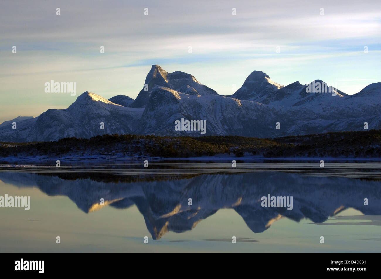 The picture shows Stetind mountain and its reflection in a fjord in ...
