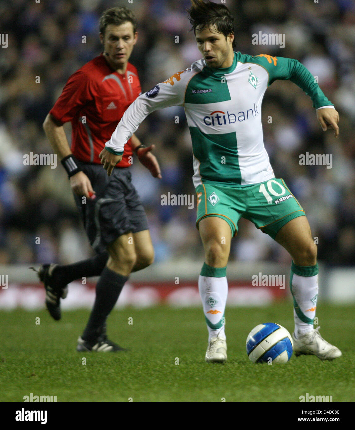 Bremen's Diego leads the ball in front of referee Alain Hamer from ...