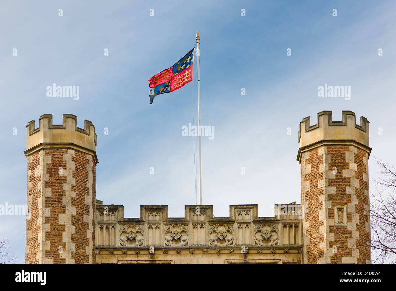 Flag flying on a mast above the front entrance to Trinity college ...