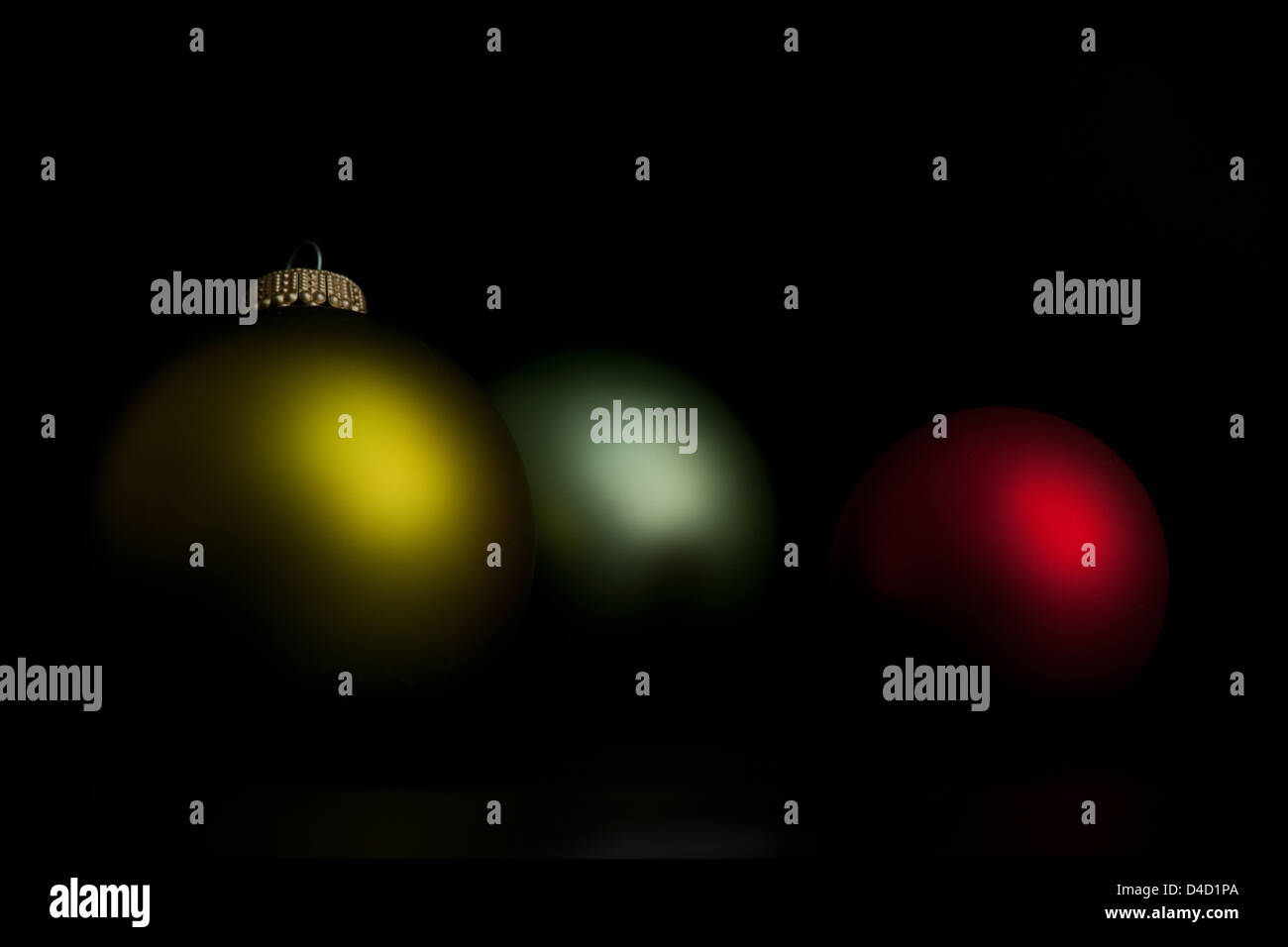 Three Christmas baubles Stock Photo - Alamy