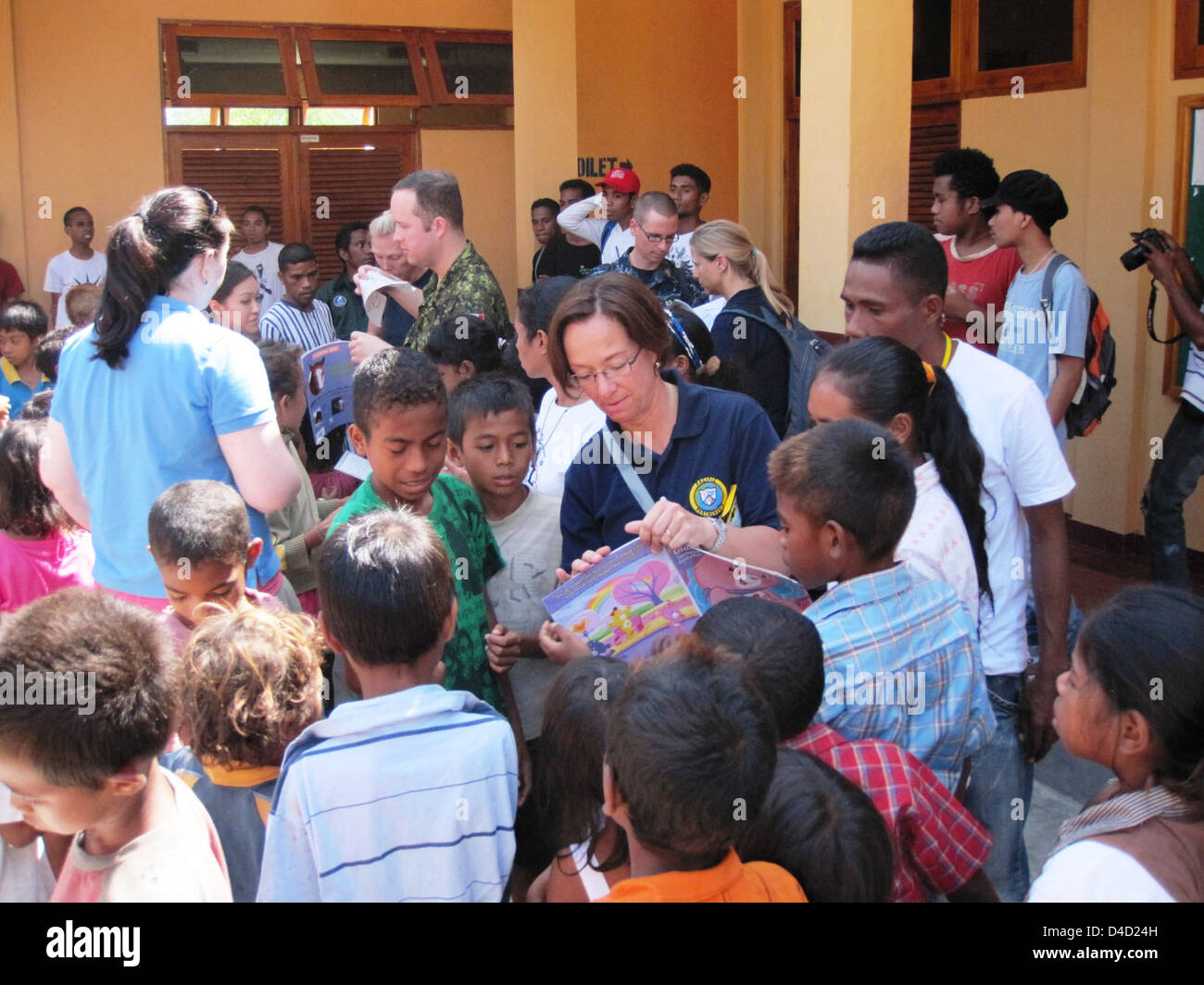 PP2010 Commodore Capt. Franchetti Hands Out Coloring Book Pages Stock ...