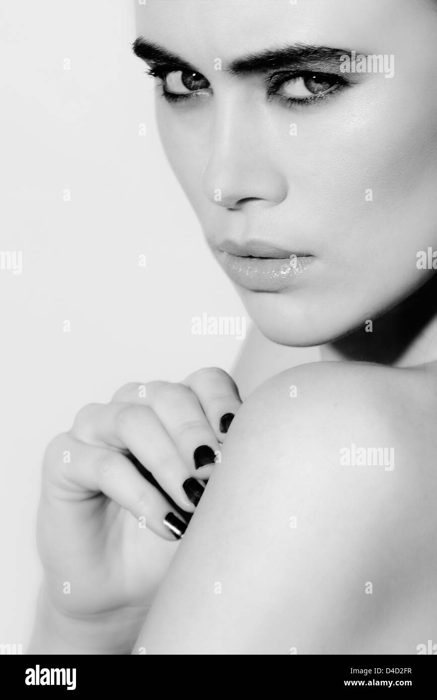 close up woman face beauty make up, looking over shoulder black & white ...