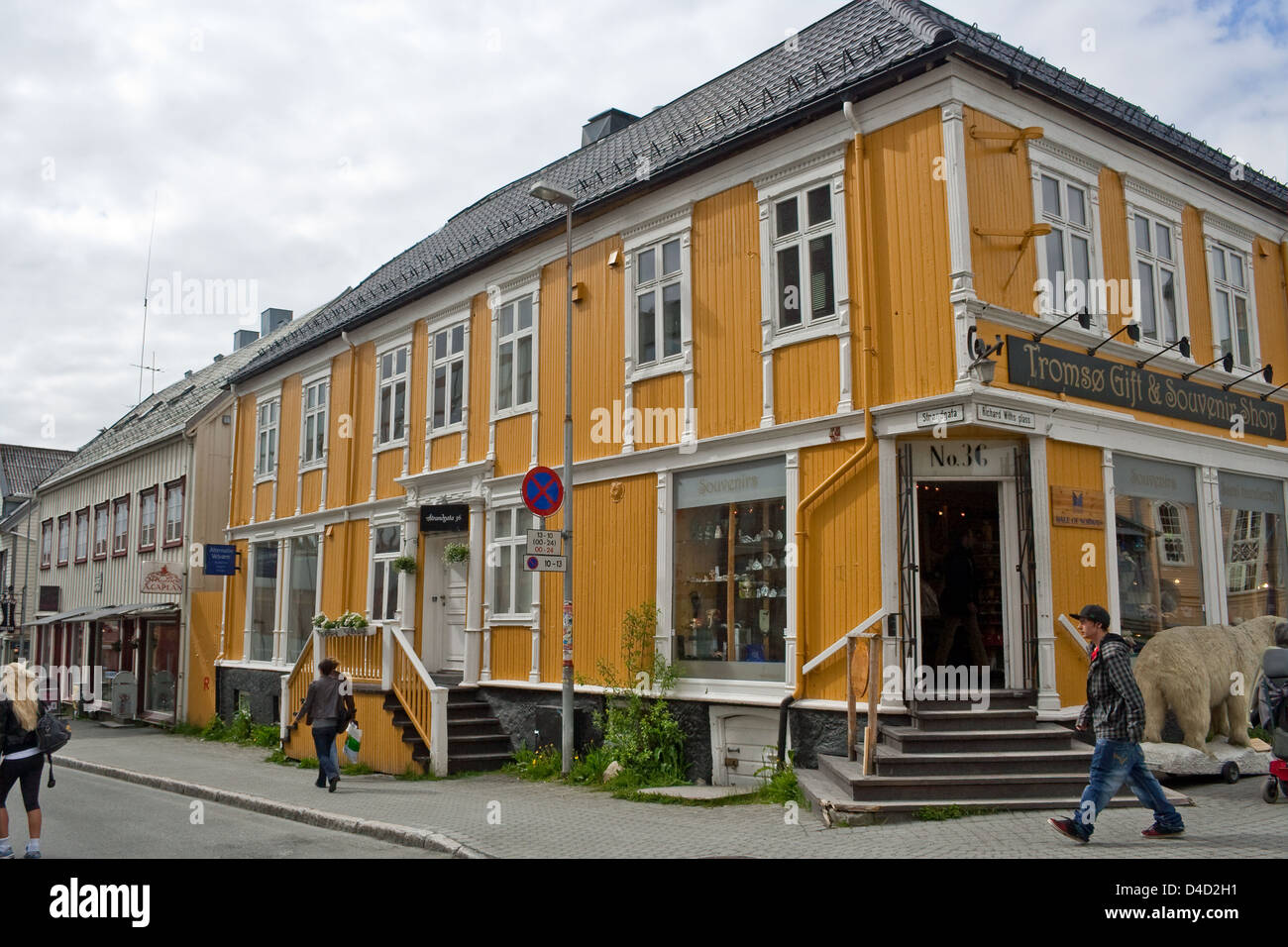 Colourful traditionally-built wooden buildings in the city of Tromso ...