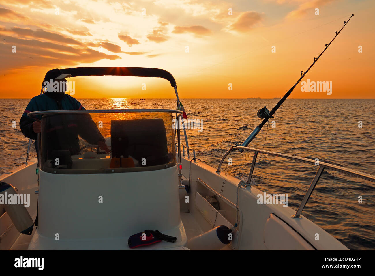 Fisherman on a boat in the ocean hi-res stock photography and images ...