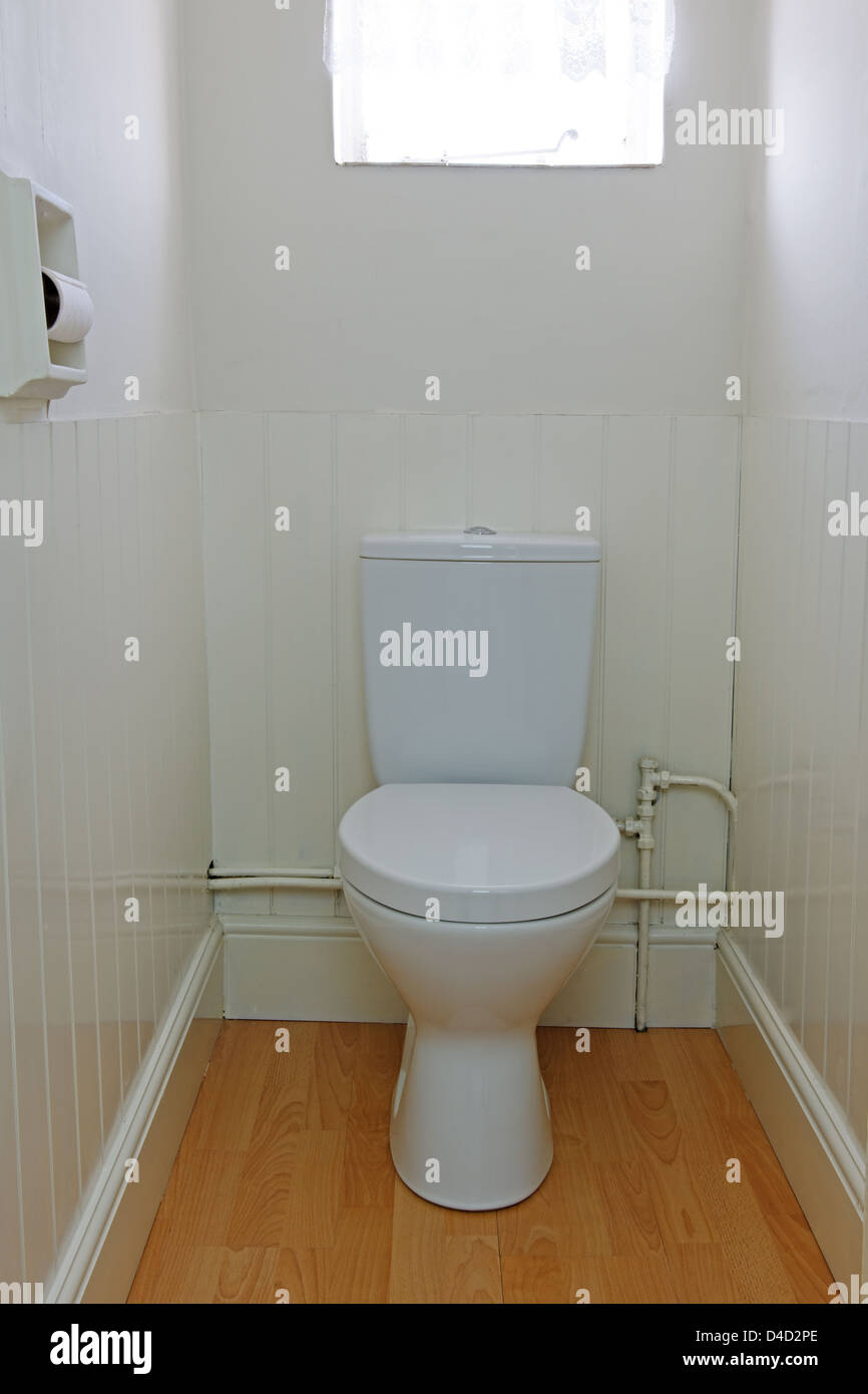 Retro toilet with wood panelled walls Stock Photo - Alamy