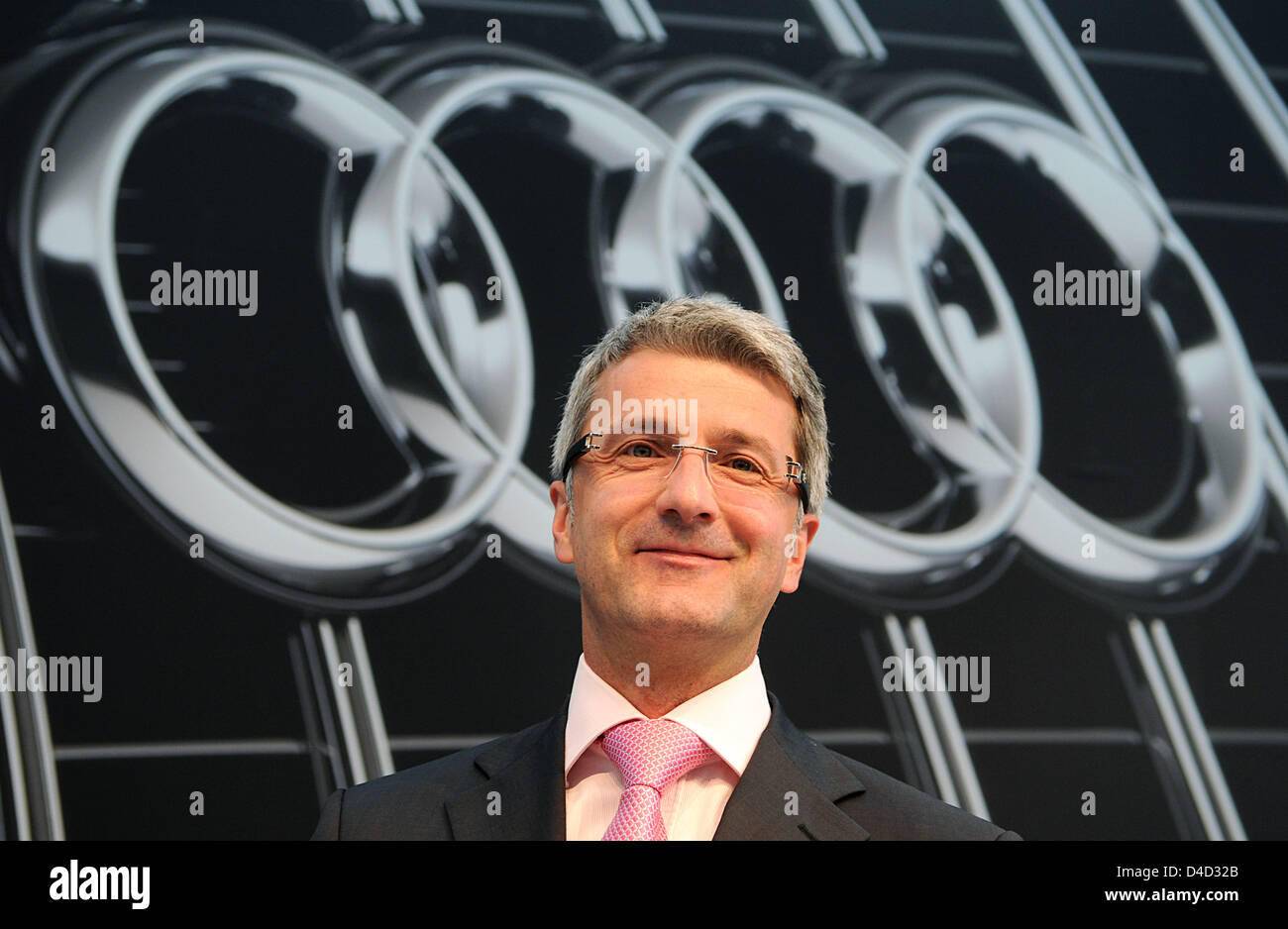 Audi CEO Rupert Stadler smiles under the company's logo before the ...