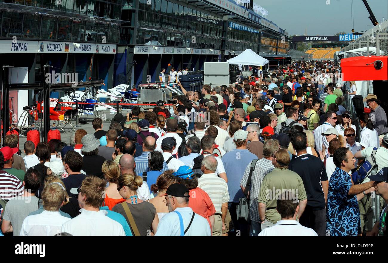 Fans flock to the pit lane of the Albert Park Circuit in Melbourne ...