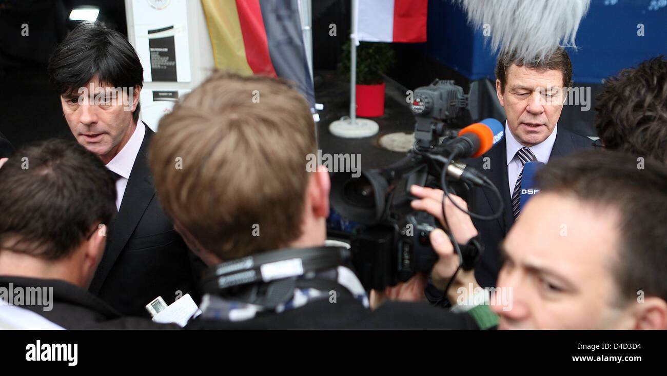 German national coach Joachim Loew (L) and Greek national coach Otto ...