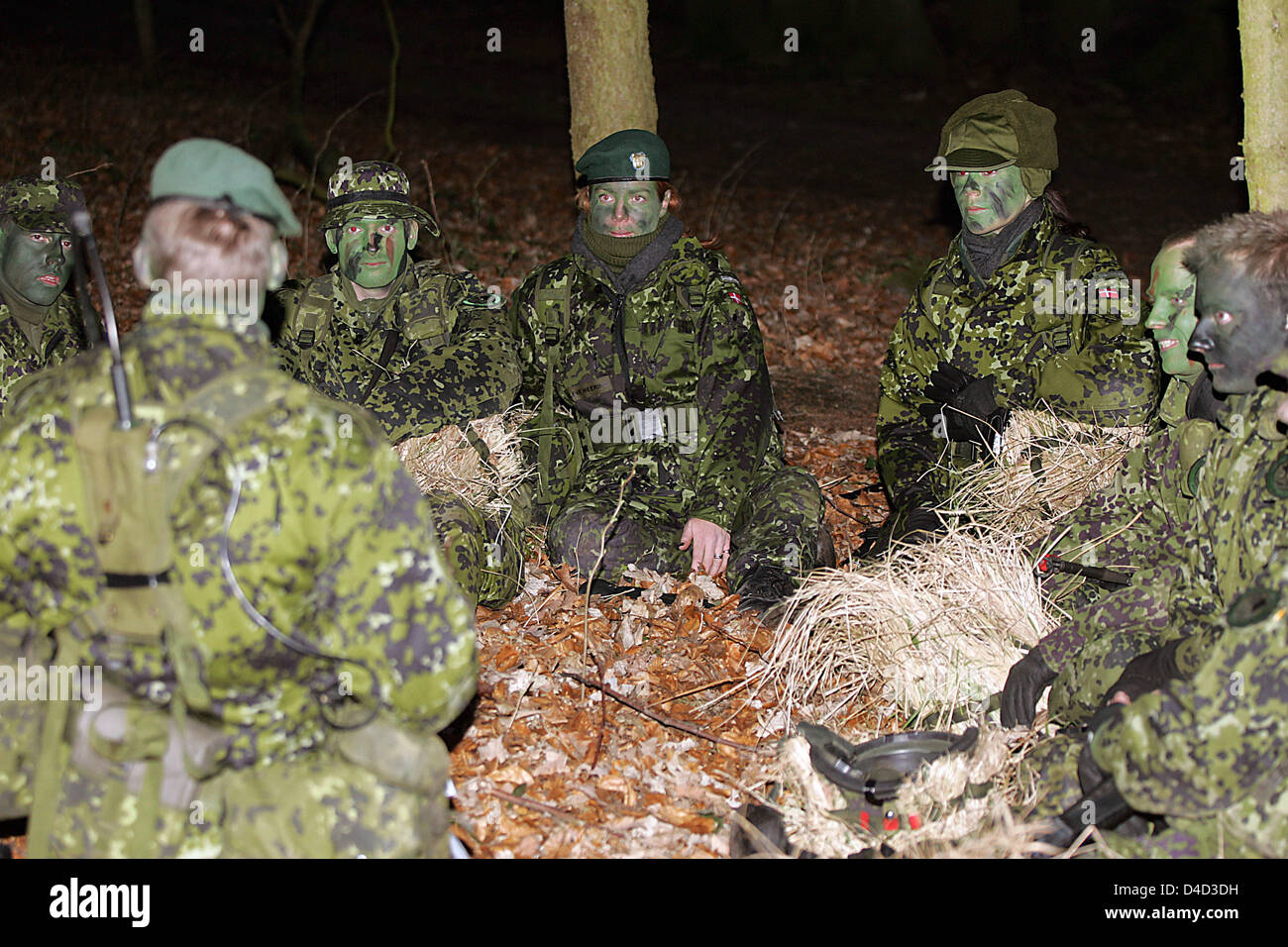 Danish Crown Princess Mary (3-R) in uniform is pictured during an ...