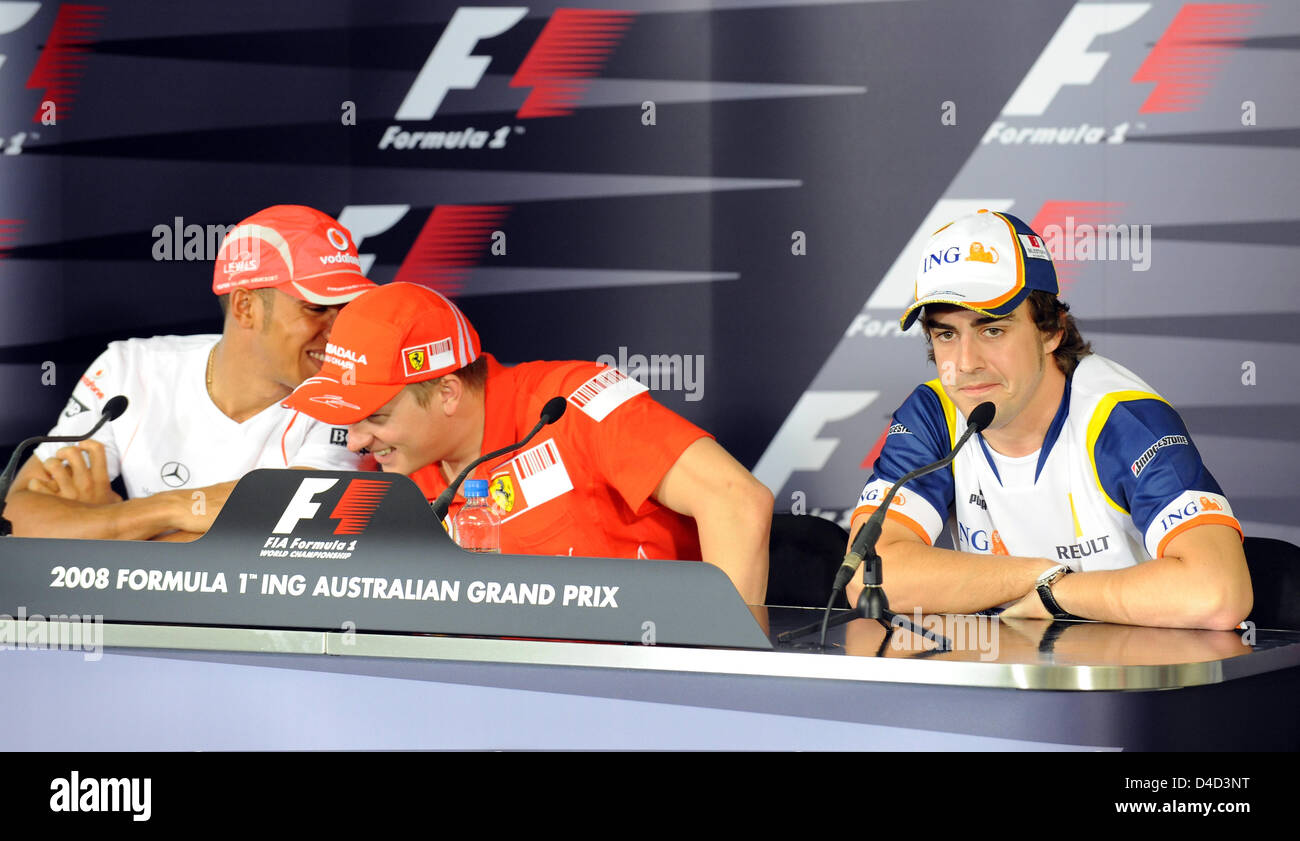Formula One drivers Kimi Raikkonen of Scuderia Ferrari (C), Finnish ...