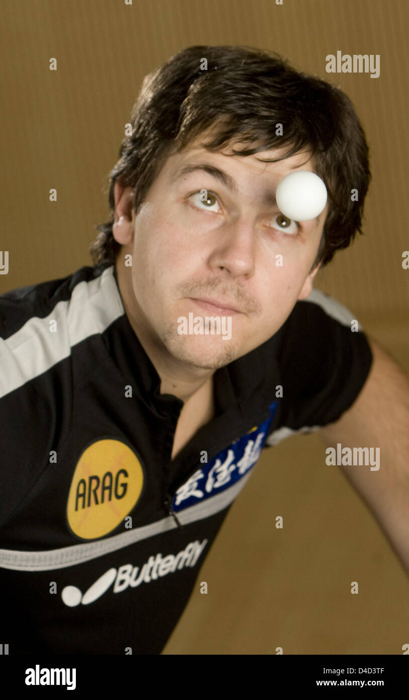 German table tennis pro Timo Boll performs a service during a photo ...