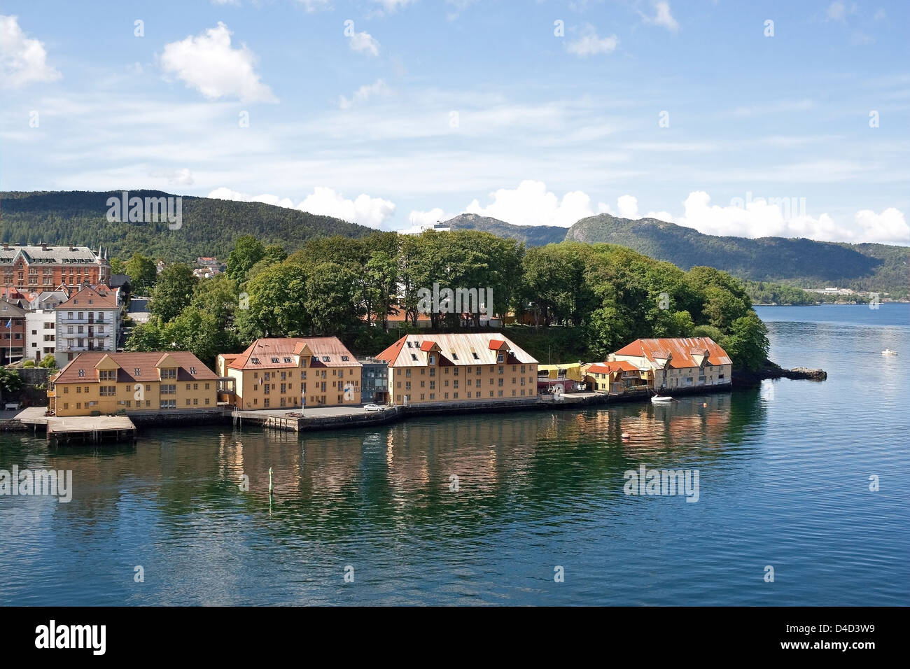 Traditional wooden buildings on the waterfront at the entrance to the ...