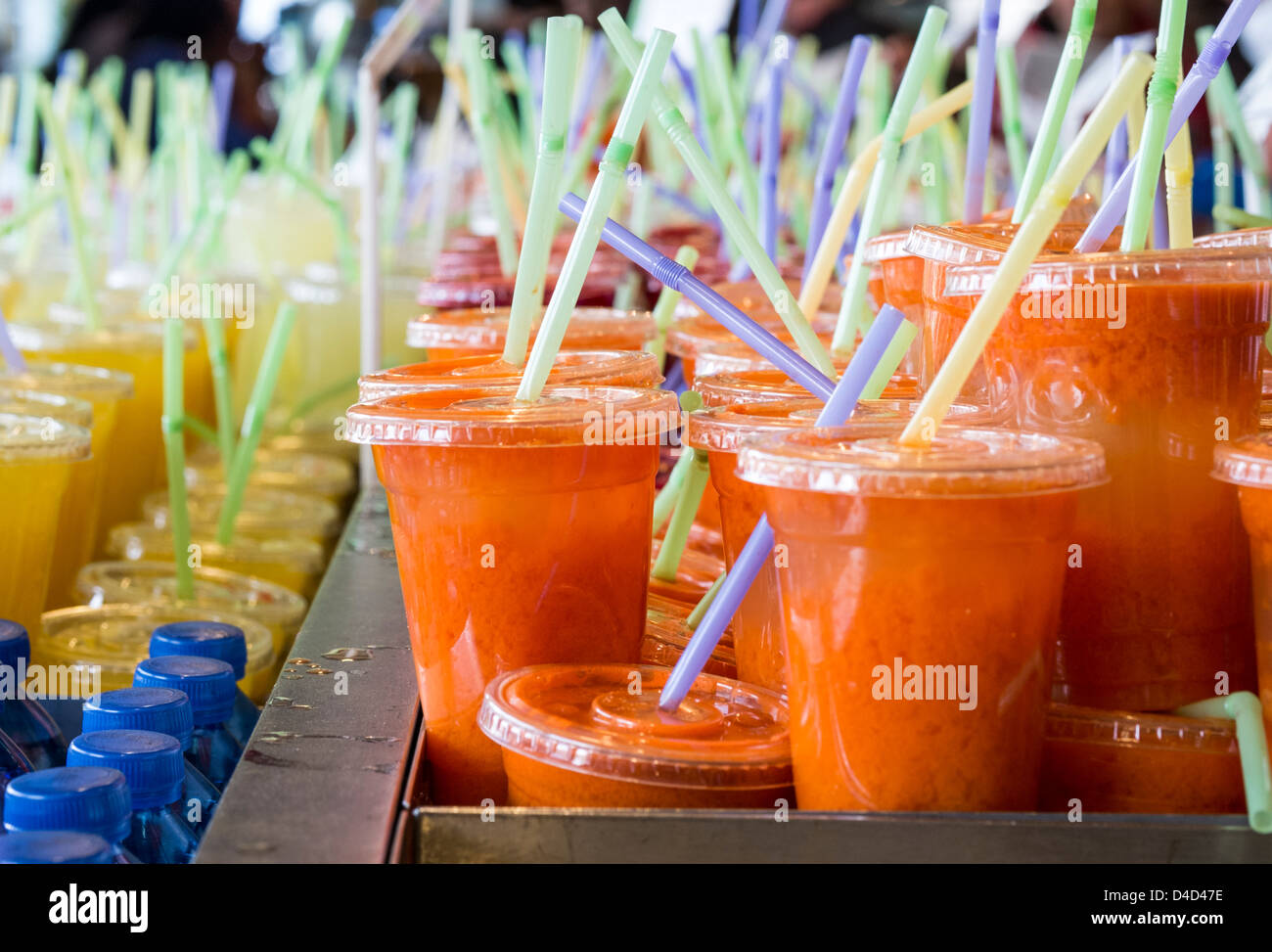Orange juice in plastic cups hi-res stock photography and images - Alamy